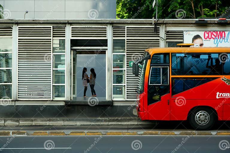 Waiting at the Bus Stop editorial photography. Image of transjakarta ...