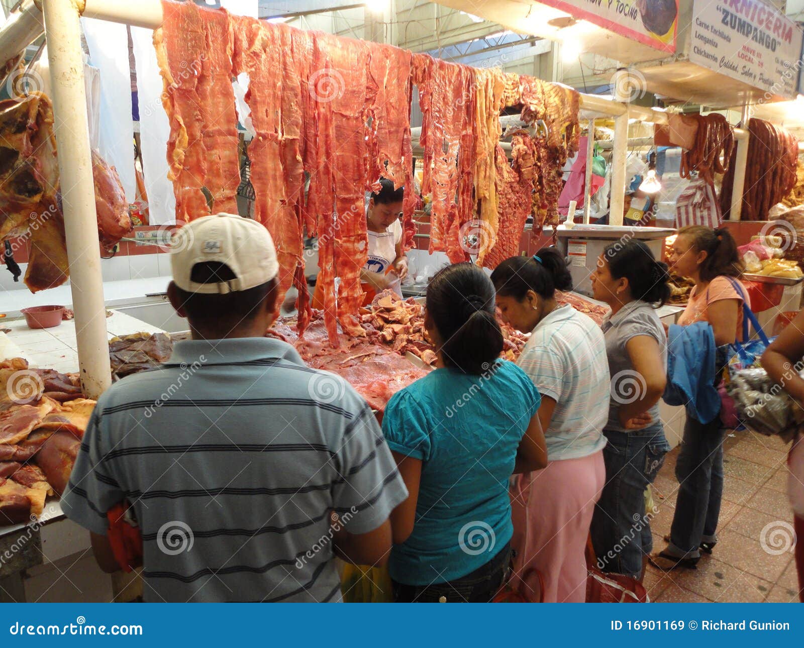 Waiting for the Butcher editorial stock image. Image of latinas - 16901169