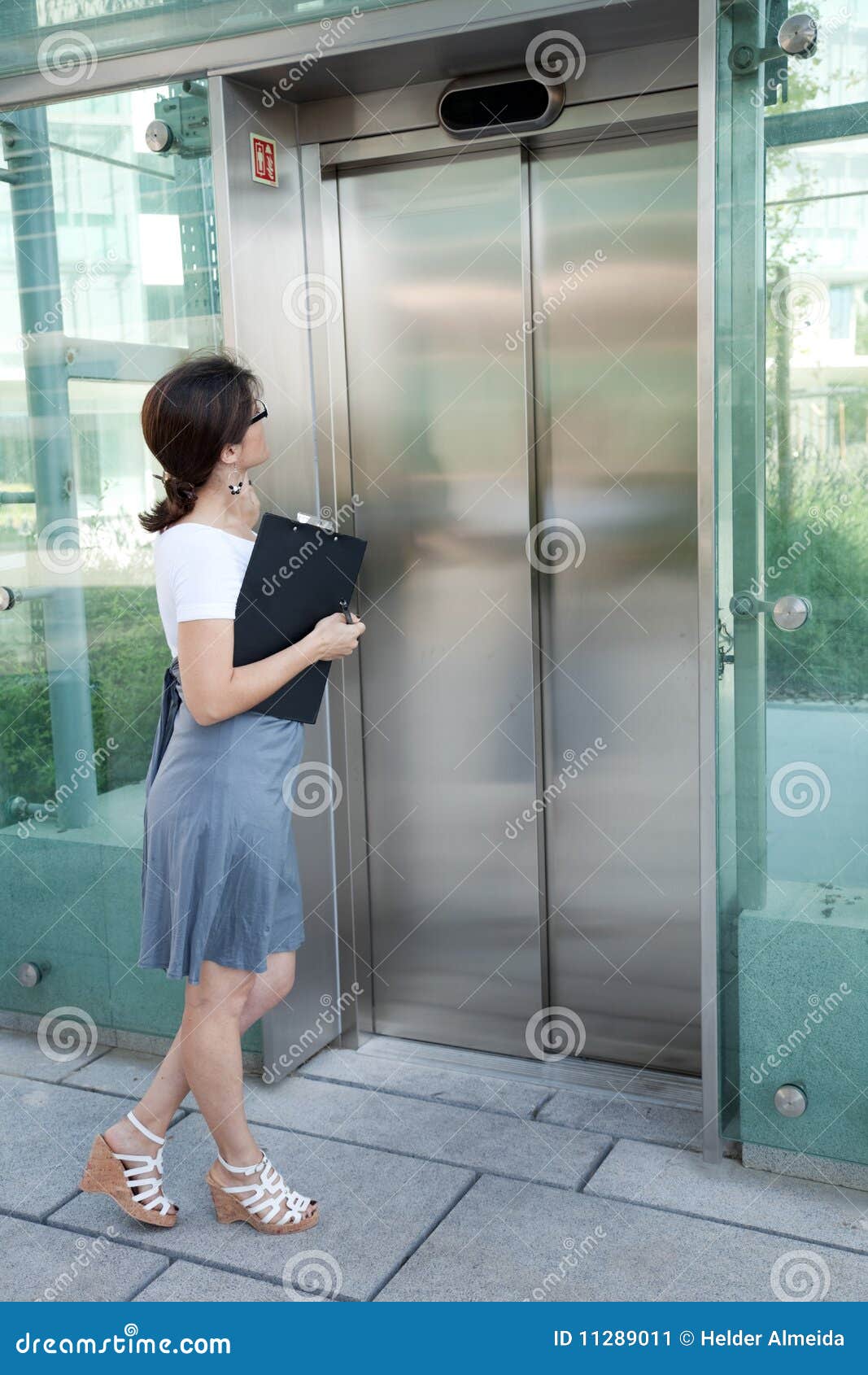 Waiting for the elevator stock image. Image of building - 11289011