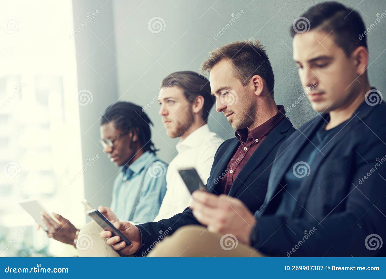 Waiting always Leads To Texting. a Group of Businessmen Using Different ...