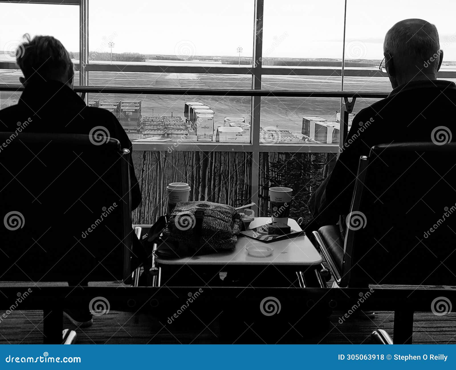 Waiting Patiently at the Airport Passing the Time Editorial Stock Photo ...