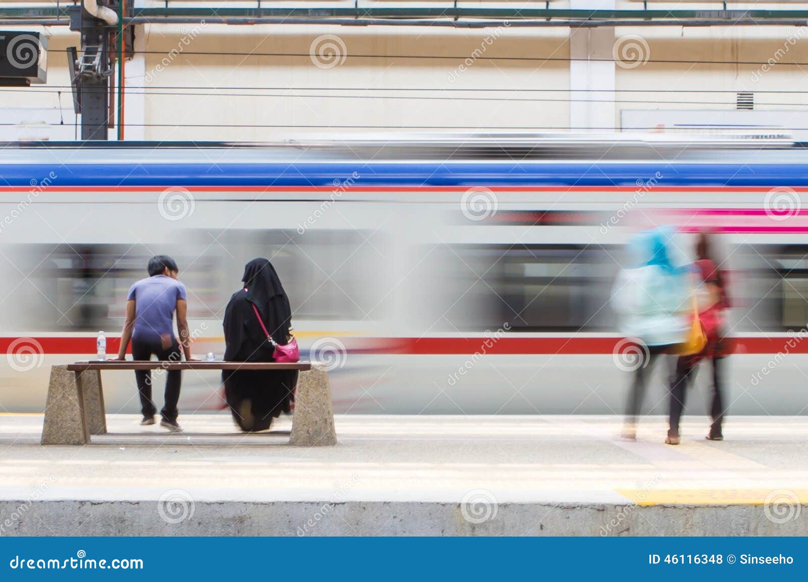 Waiting at the Railway Station Stock Photo - Image of burqua, holiday ...