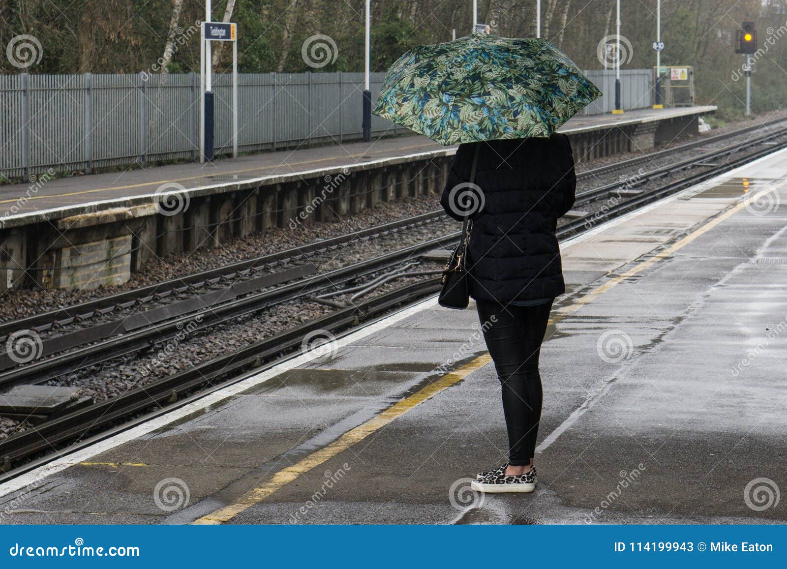 Waiting for a late train stock image. Image of waiting - 114199943