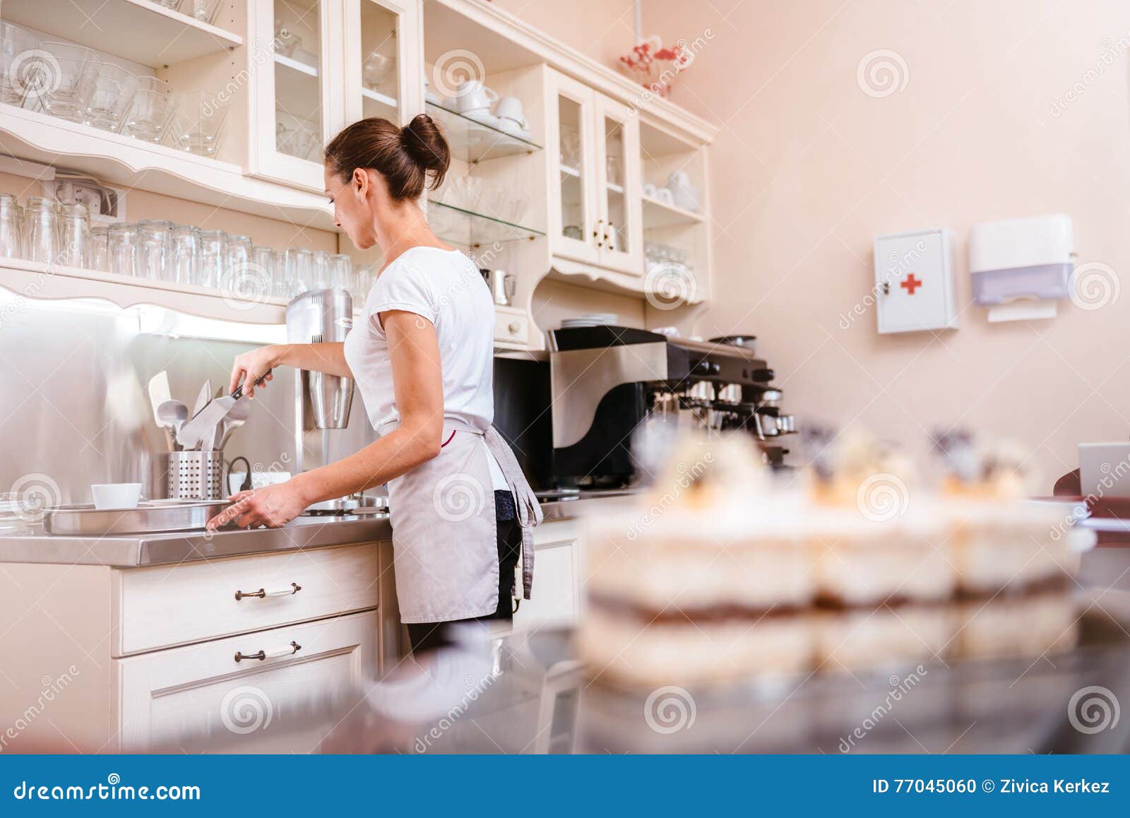 Waitress behind a counter stock photo. Image of morning - 77045060