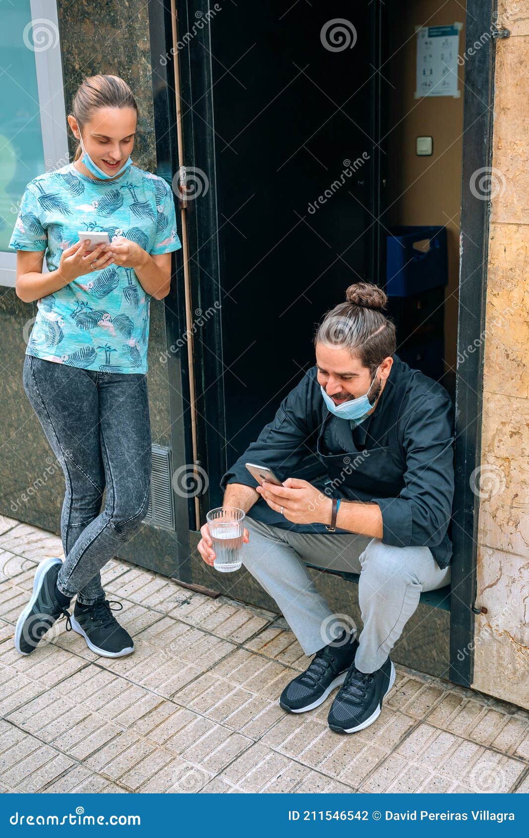 Waitress and Chef Making a Break at the Back Door Stock Photo - Image ...