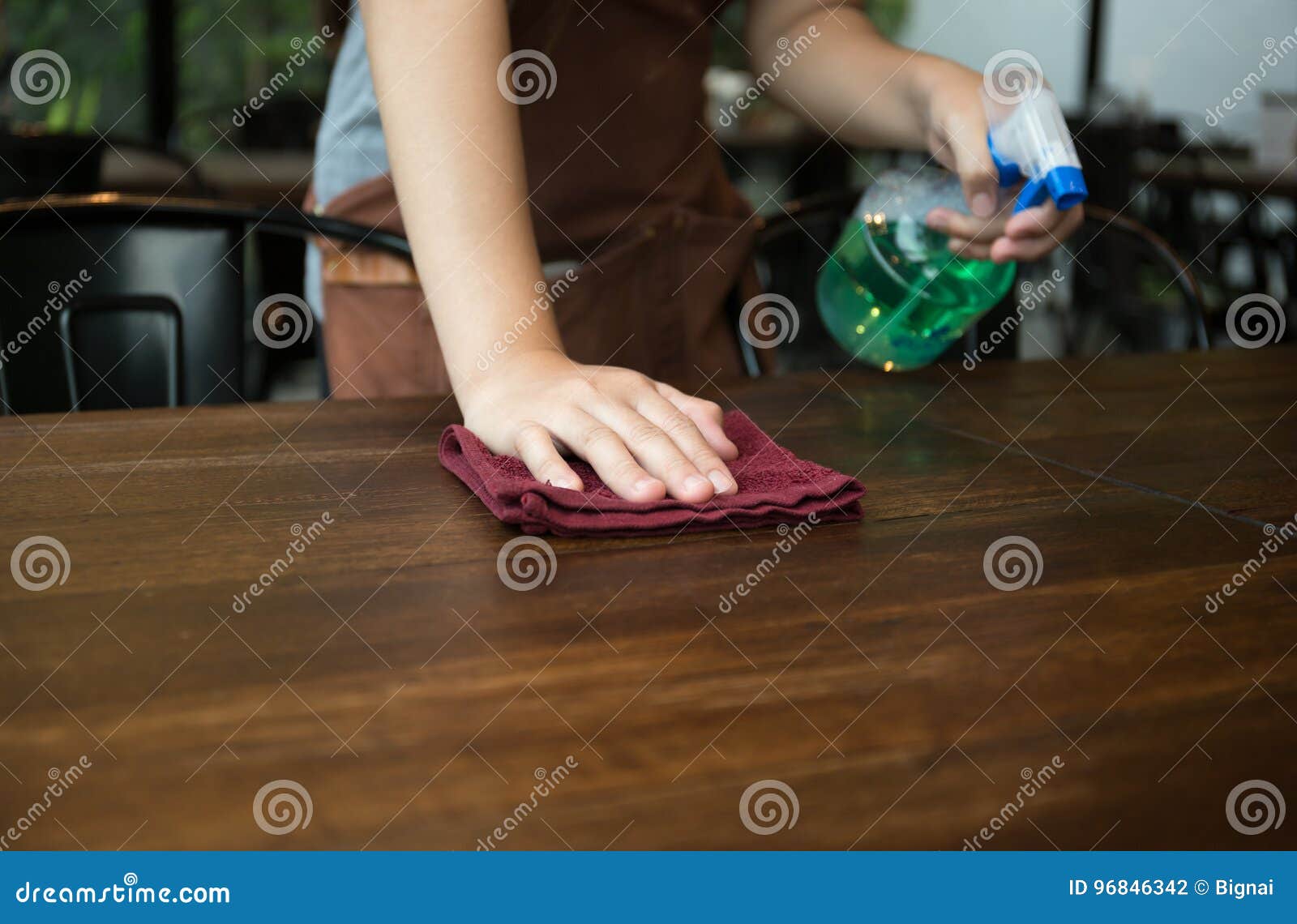 Waitress Cleaning the Table with Spray Disinfectant Stock Photo - Image ...