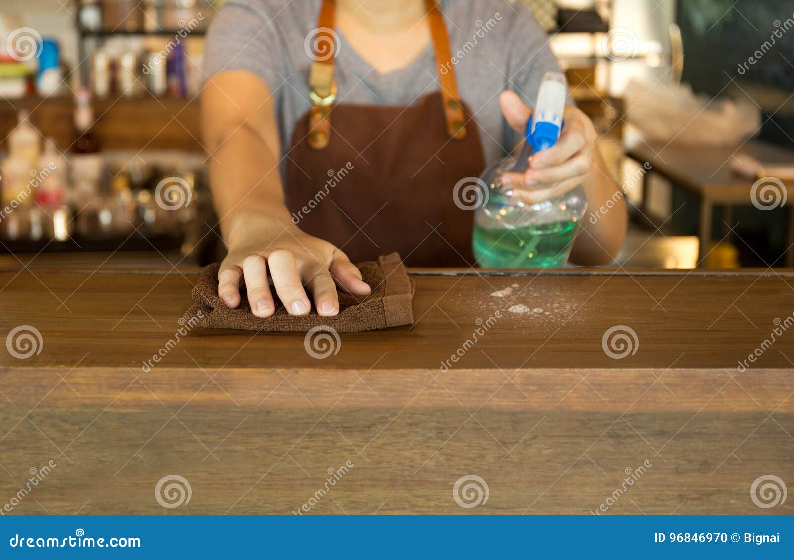 Waitress Cleaning the Top Bar with Spray Disinfectant Stock Photo ...
