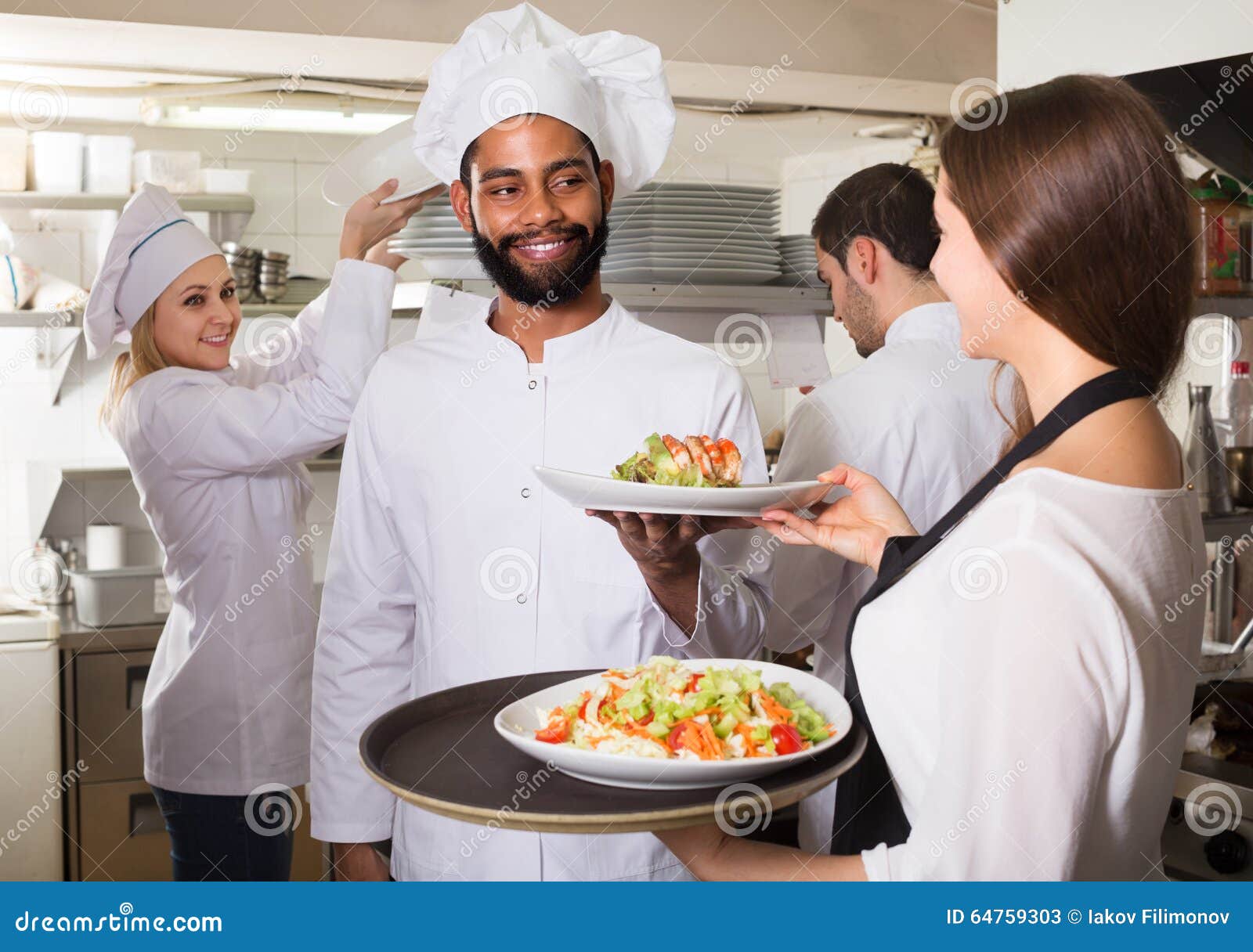 Waitress and Cooking Team in Restaurant Stock Image - Image of kitchen ...