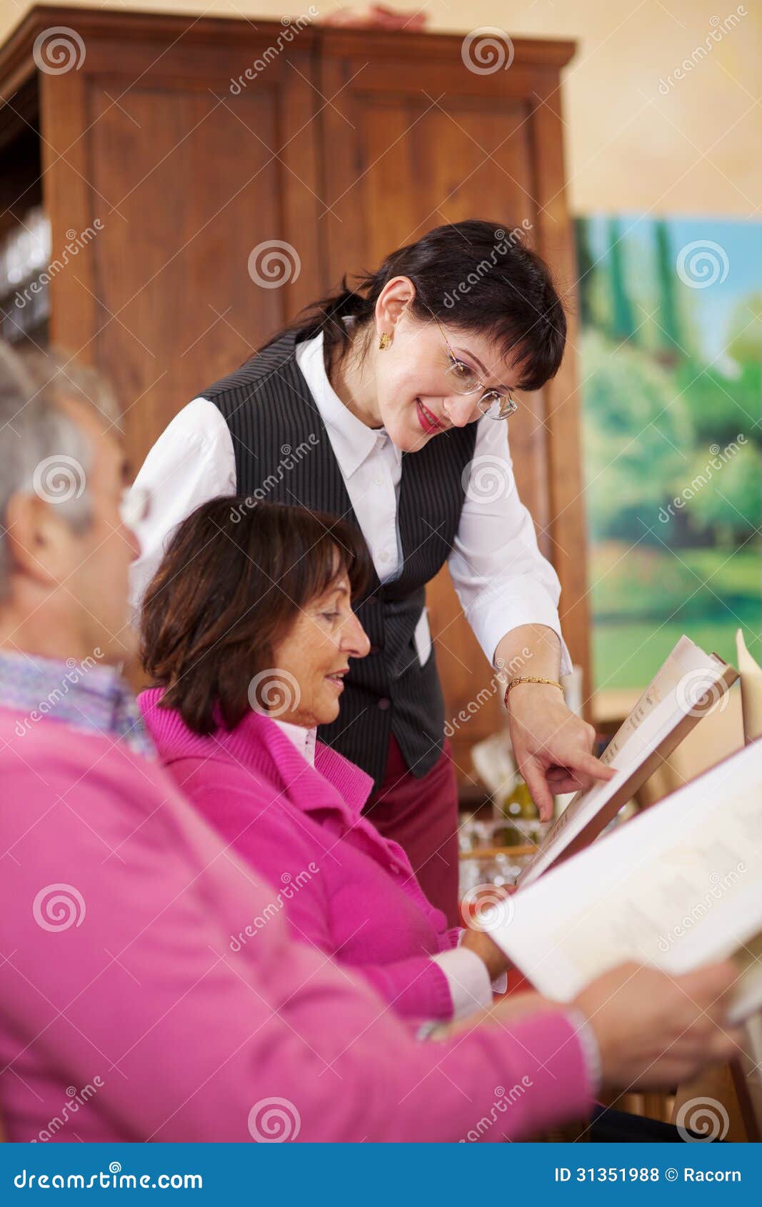 Waitress Explaining To Guest Stock Photo - Image of bestager, beverage ...
