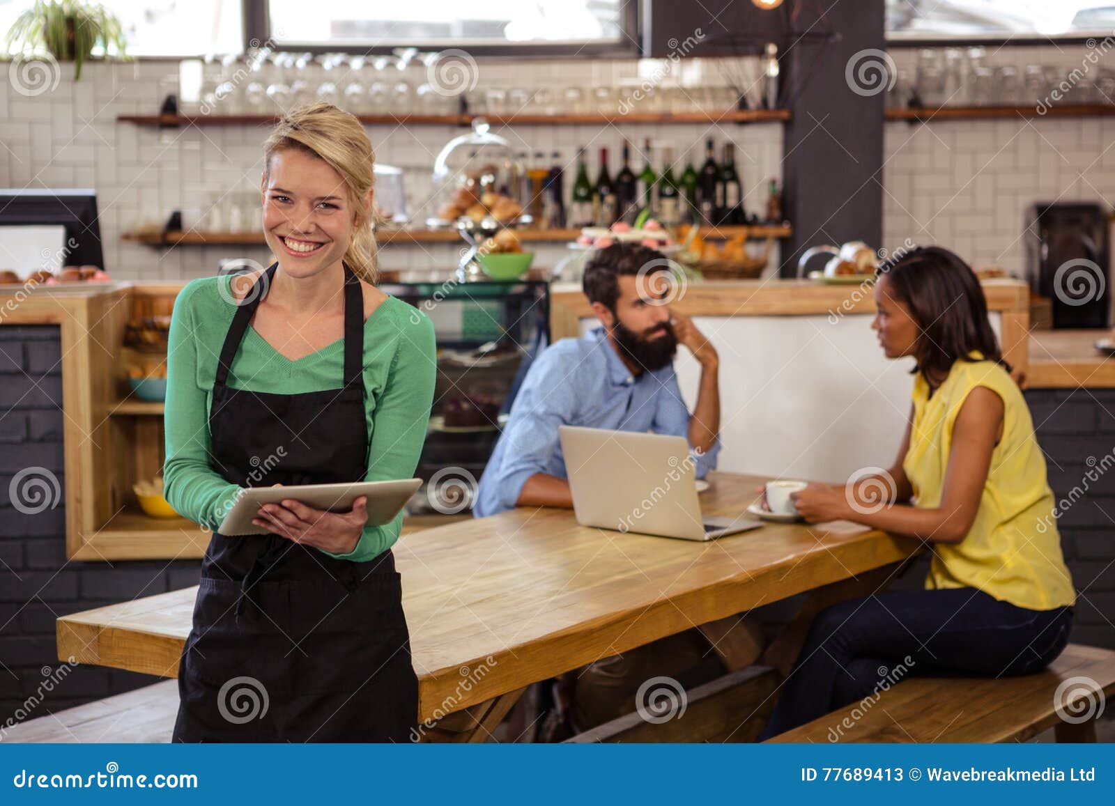 Waitress holding a tablet stock image. Image of caucasian - 77689413