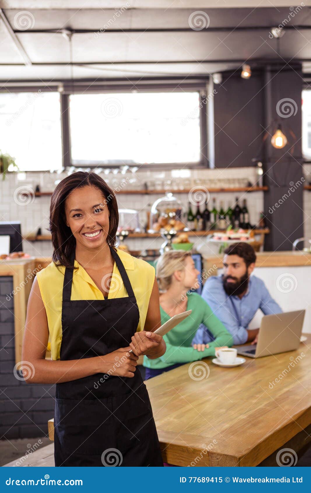 Waitress holding a tablet stock image. Image of food - 77689415