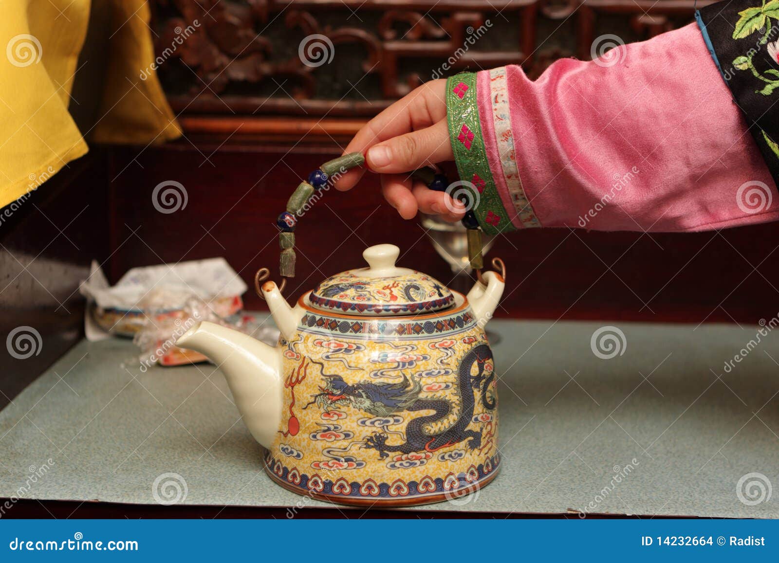 Waitress holding teapot stock photo. Image of drink, cafe - 14232664