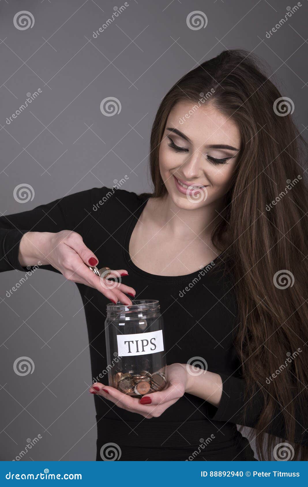 Waitress Holding a Tips Container and Cash Stock Photo - Image of ...