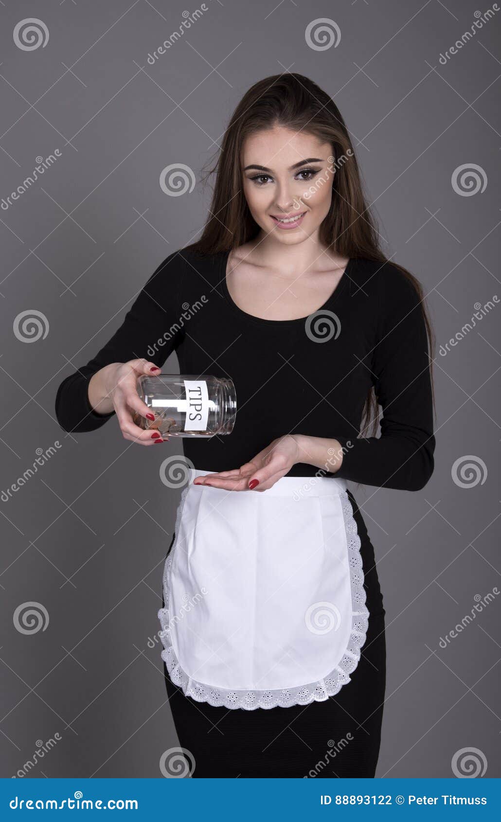 Waitress Holding a Tips Container and Cash Stock Photo - Image of ...