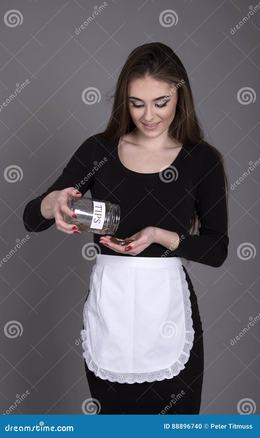 Waitress Holding a Tips Container and Counting Cash Stock Photo - Image ...