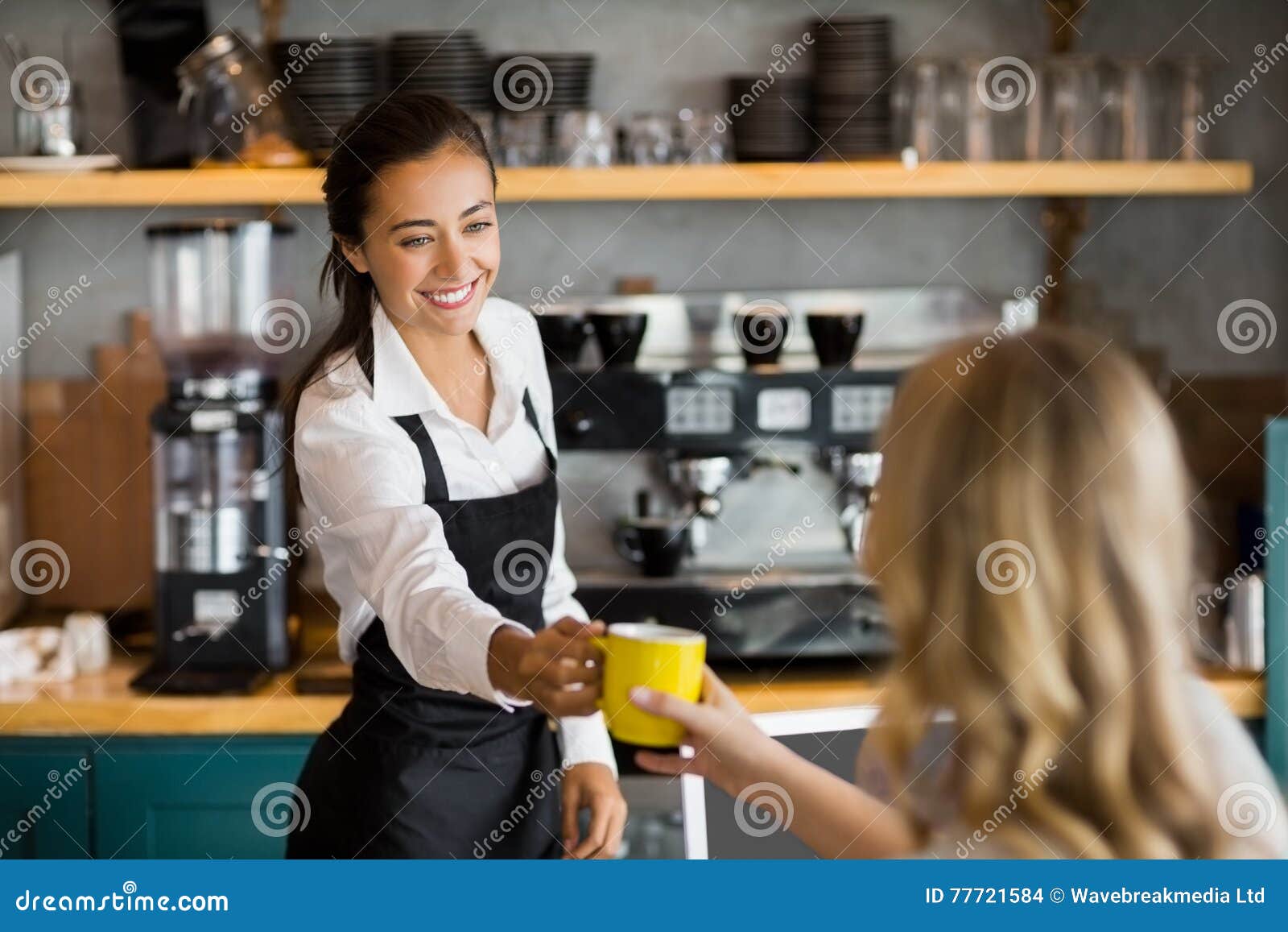 Waitress Offering a Cup of Coffee Stock Photo - Image of serving ...
