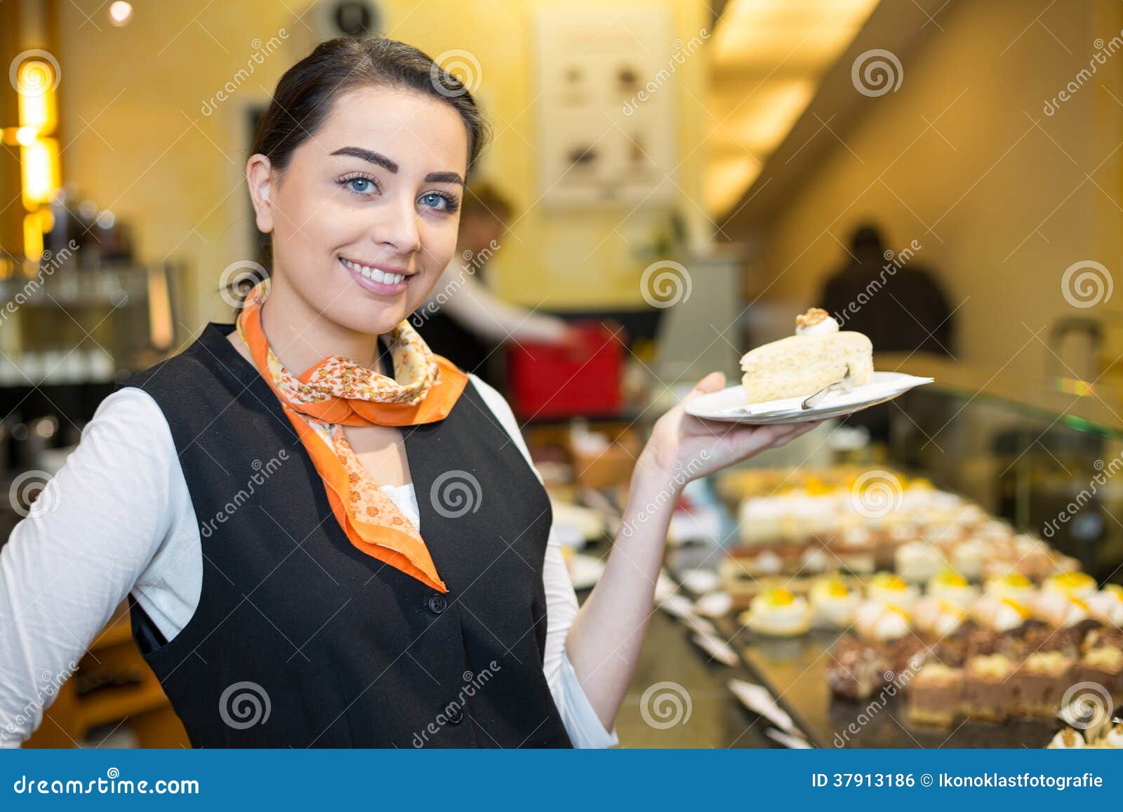 Waitress Presenting Cake in Cafe or Confectionery Stock Photo - Image ...