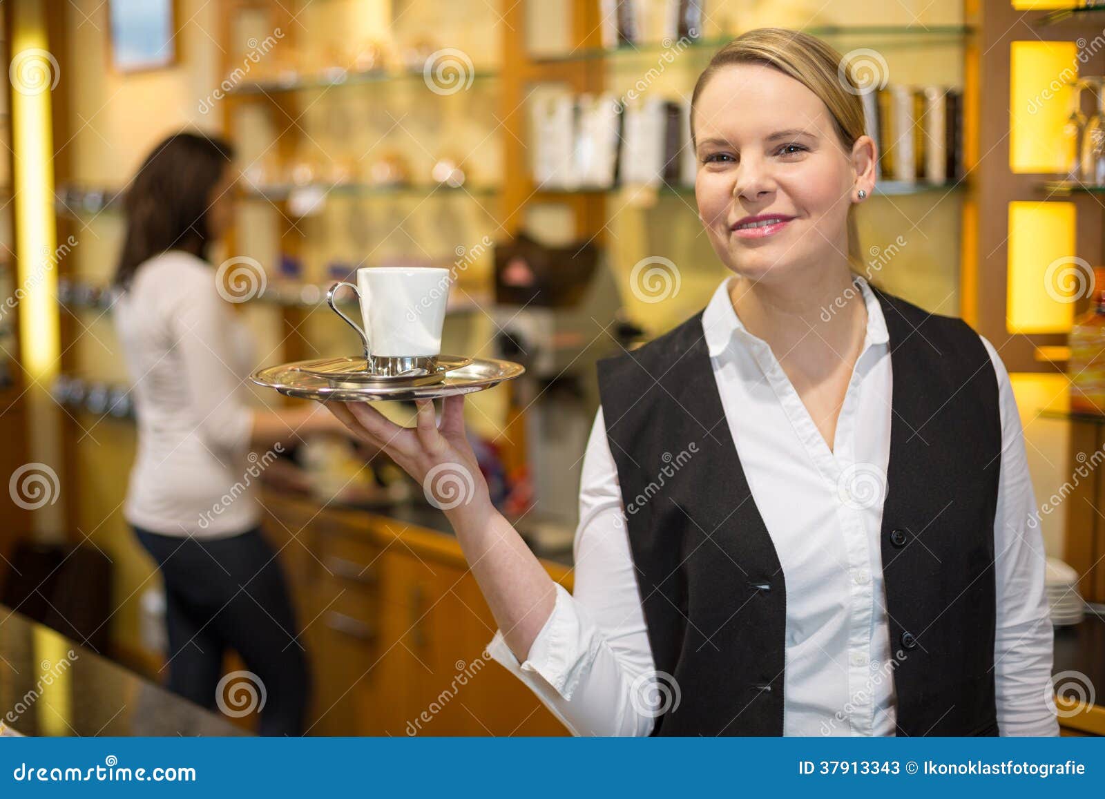 Waitress Presenting Cup of Coffee or Tea Stock Image - Image of women ...