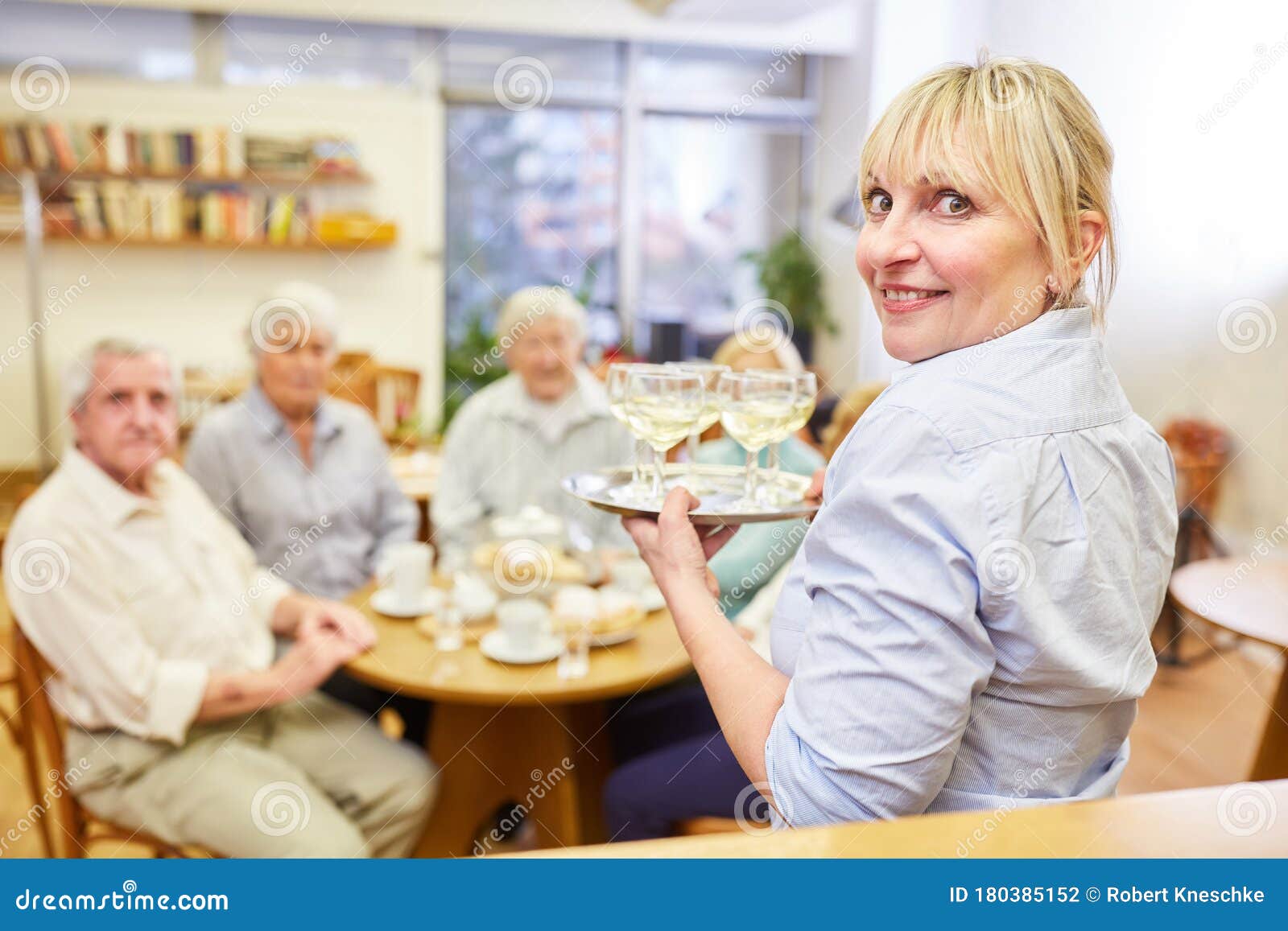 Waitress Serves White Wine for Senior Group Stock Photo - Image of cafe ...