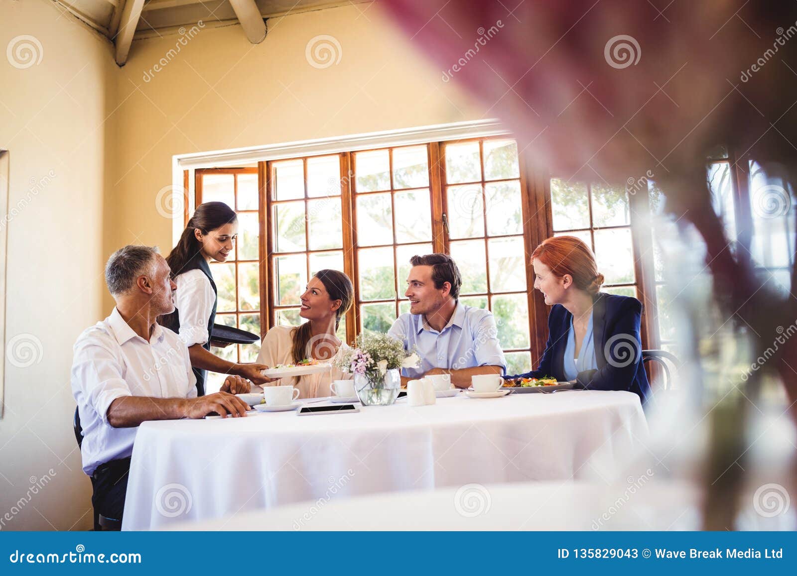 Waitress Serving Food on the Table Stock Image - Image of happy ...