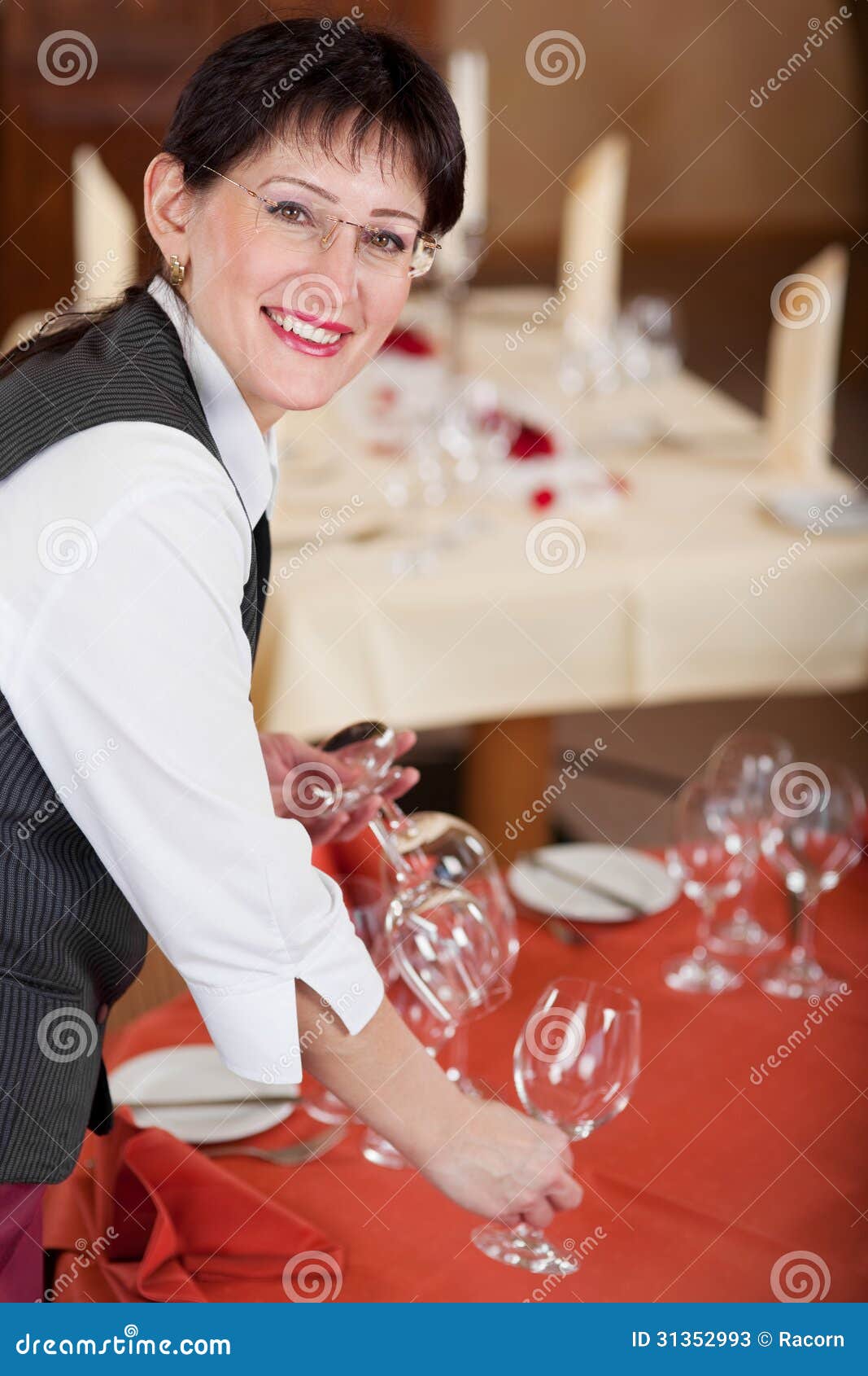 Waitress setting the table stock image. Image of profession - 31352993