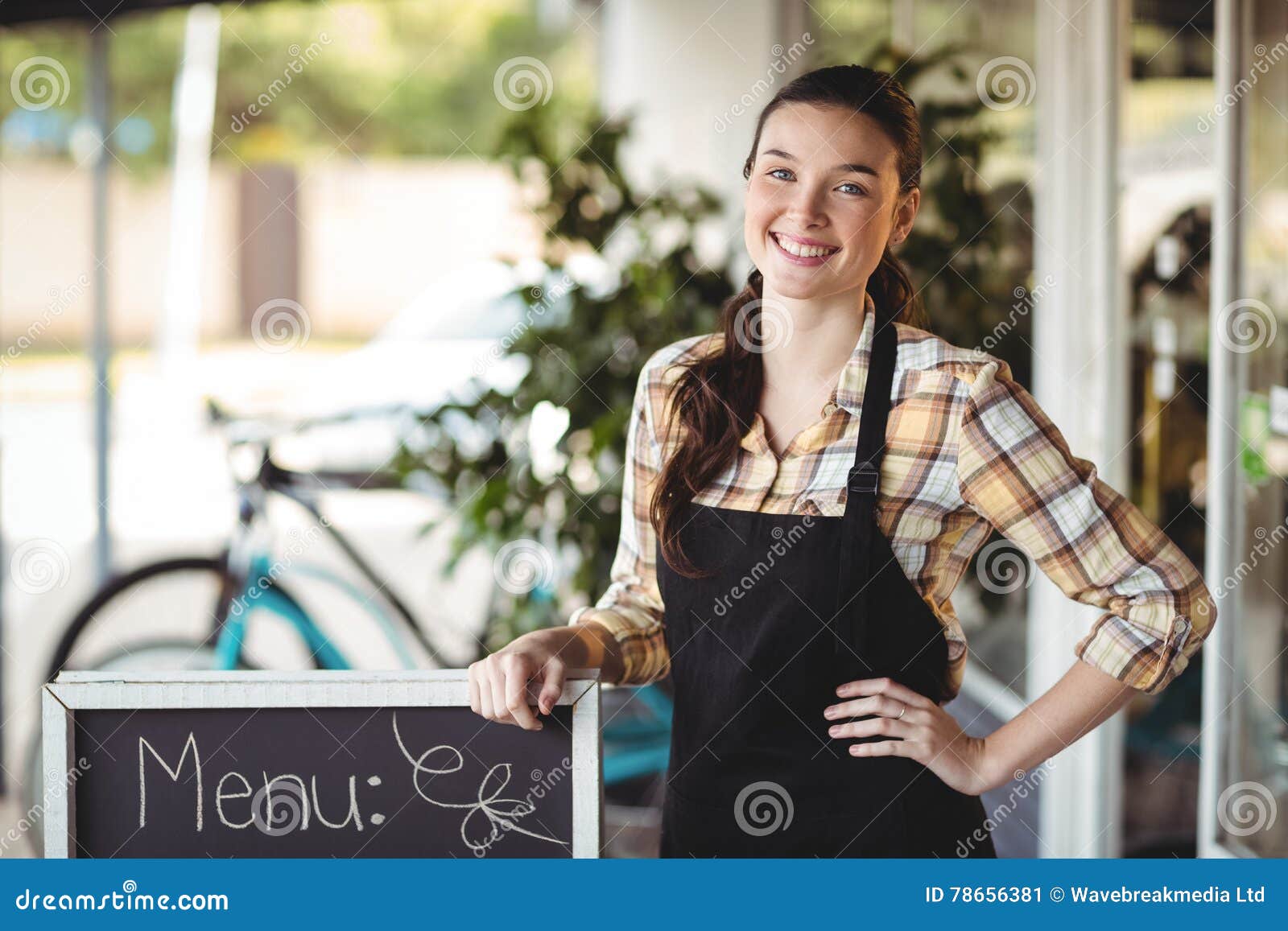Waitress Standing with Menu Board Outside the Cafe Stock Image - Image ...