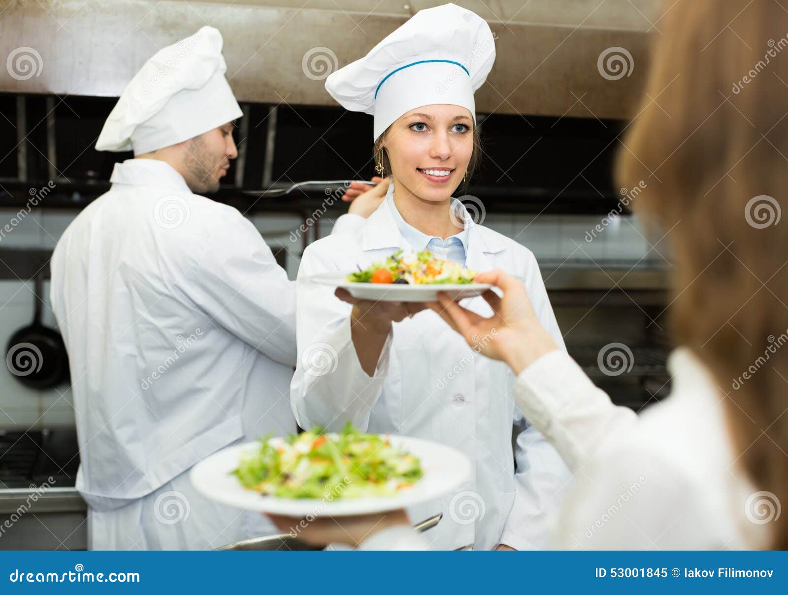 Waitress Taking Dish from Kitchen Stock Image - Image of bistro, plate ...