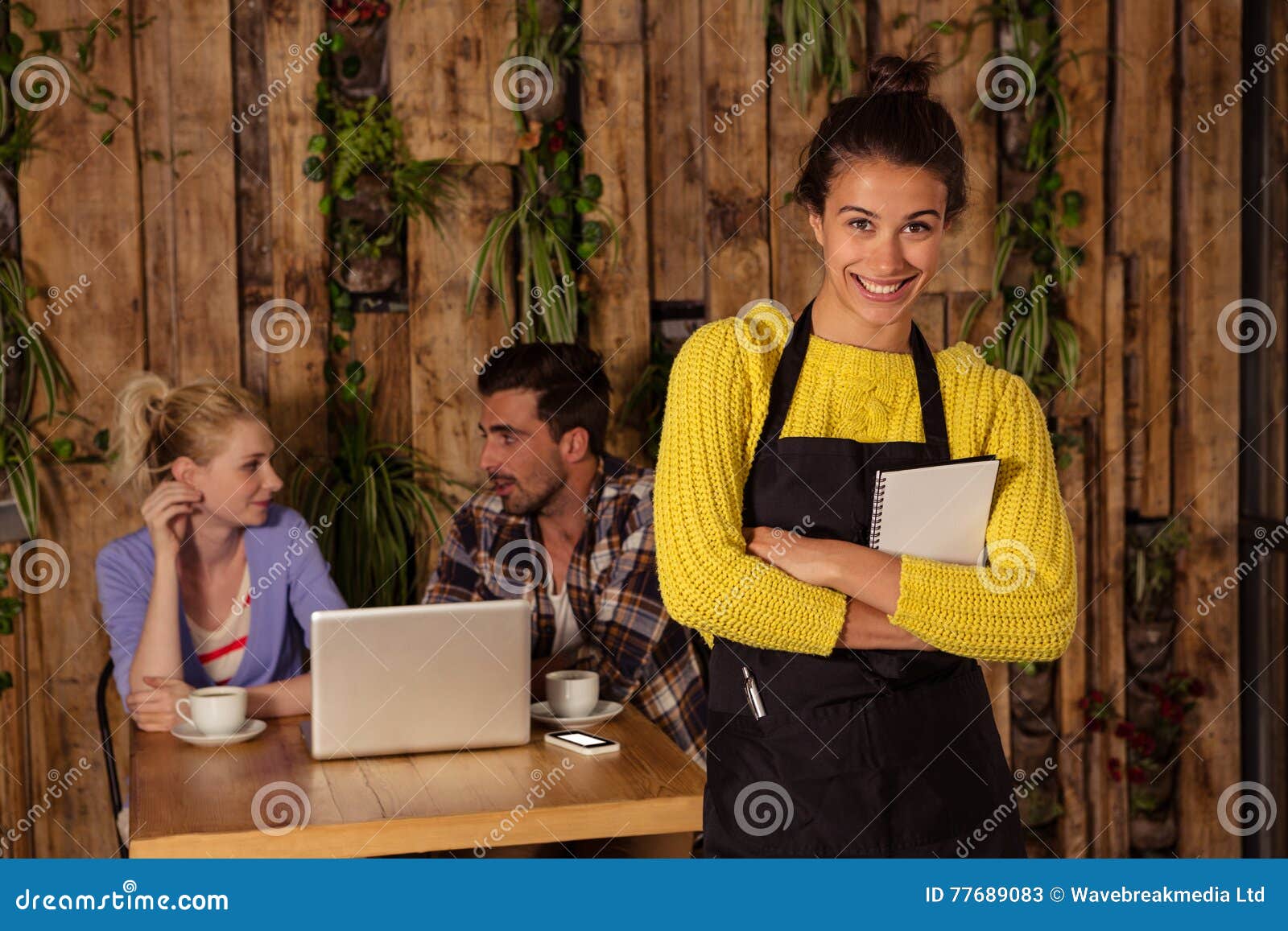 A Waitress is Taking the Order in Front of the Two Friends Stock Image ...