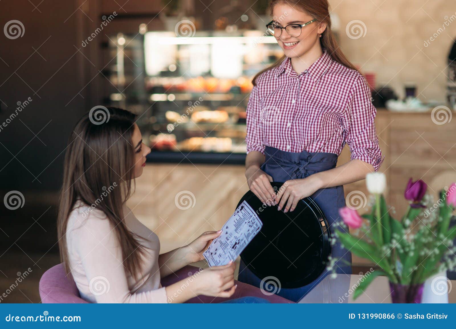 Waitress Taking Order from Her Customer in a Cafe Stock Photo - Image ...
