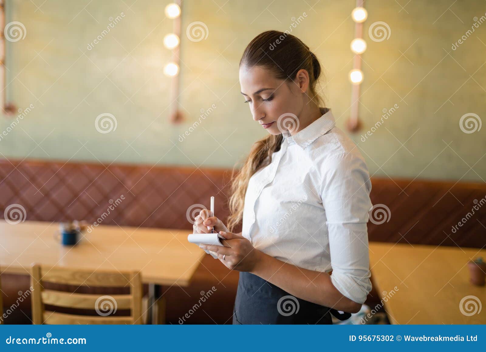Waitress Taking an Order on Notepad Stock Photo - Image of drink ...