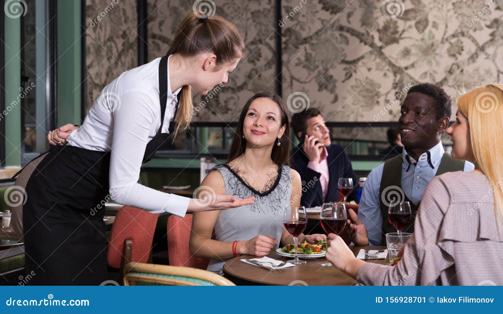 Waitress Talking with Satisfied Guests Stock Image - Image of indoors ...