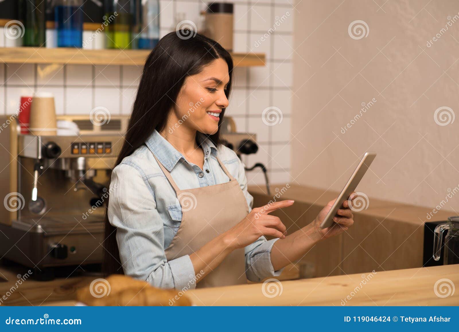 Waitress Using Digital Tablet in Cafe Stock Photo - Image of people ...