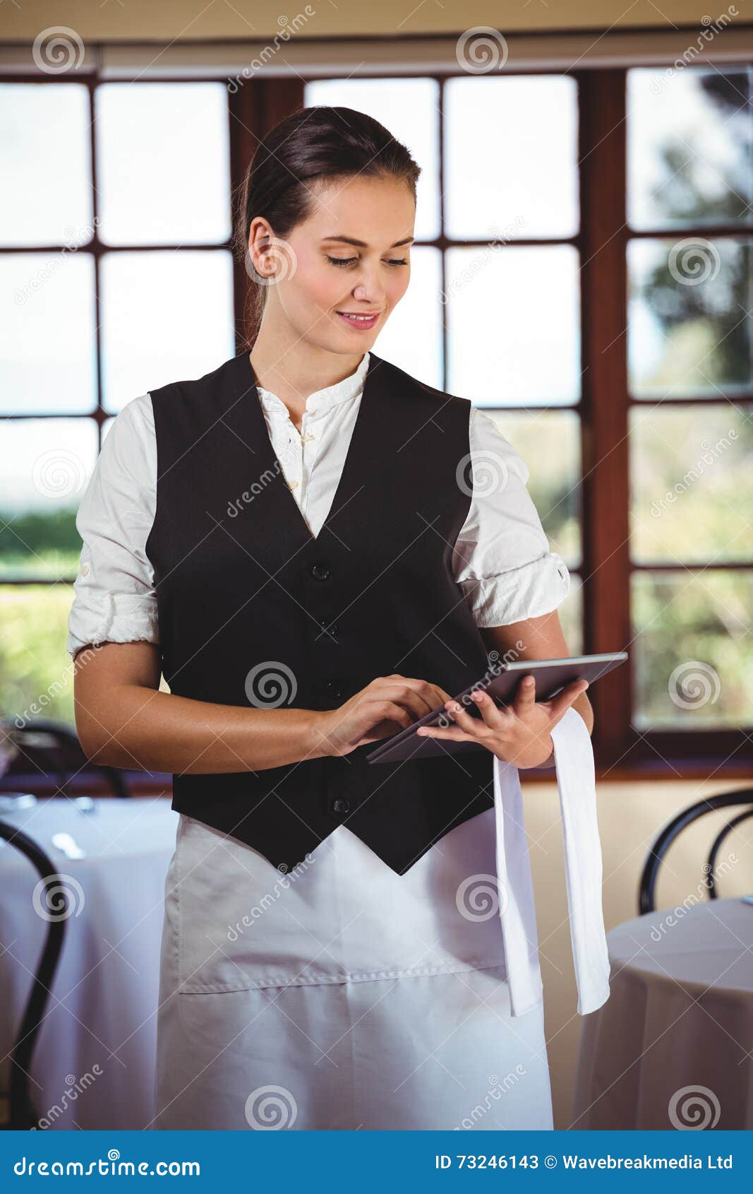 Waitress Using Digital Tablet Stock Image - Image of tablet, reading ...