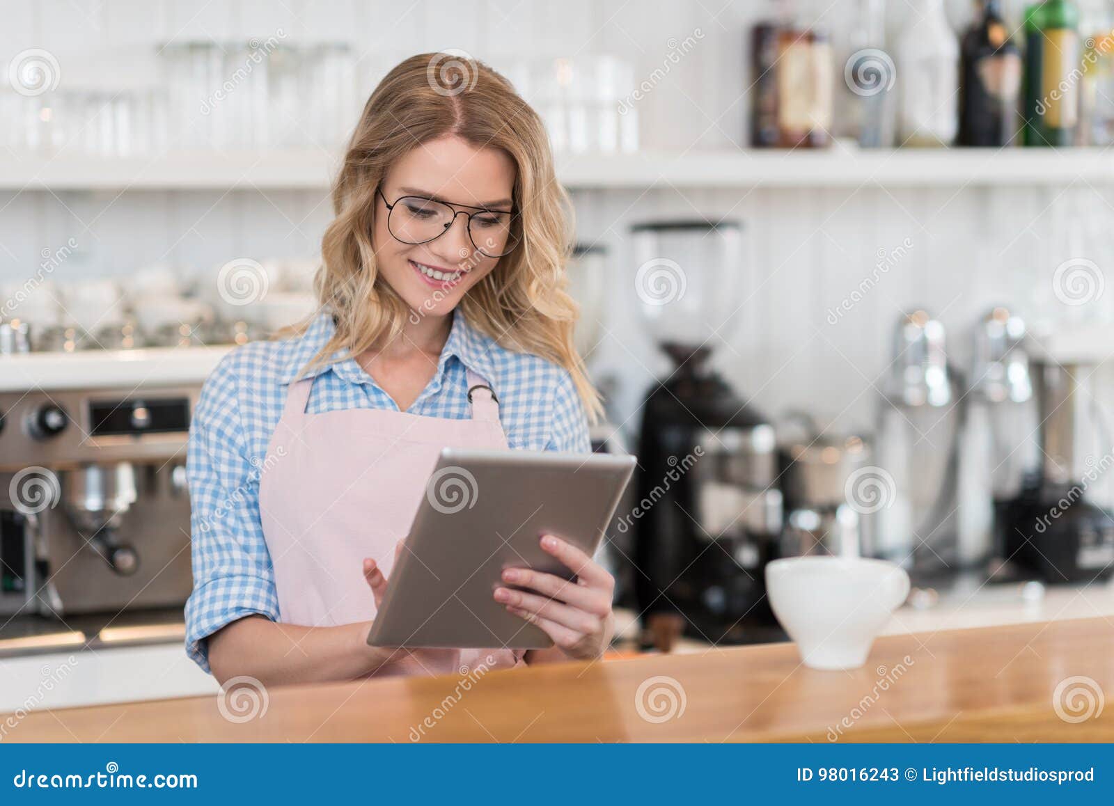 Waitress Using Digital Tablet during Work in Coffee Shop Stock Image ...