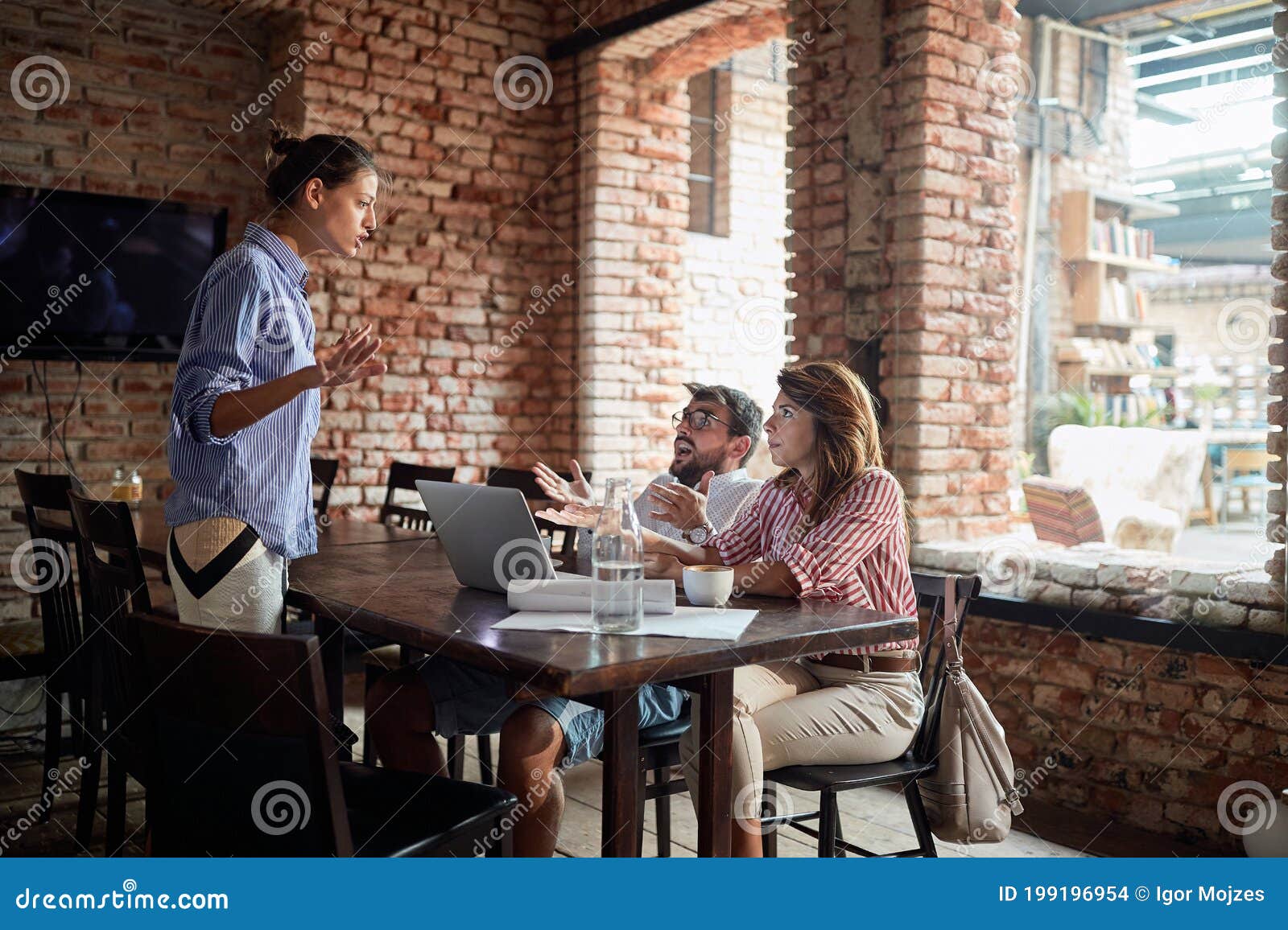 Waitress and Young Couple Arguing about Noise Stock Photo - Image of ...