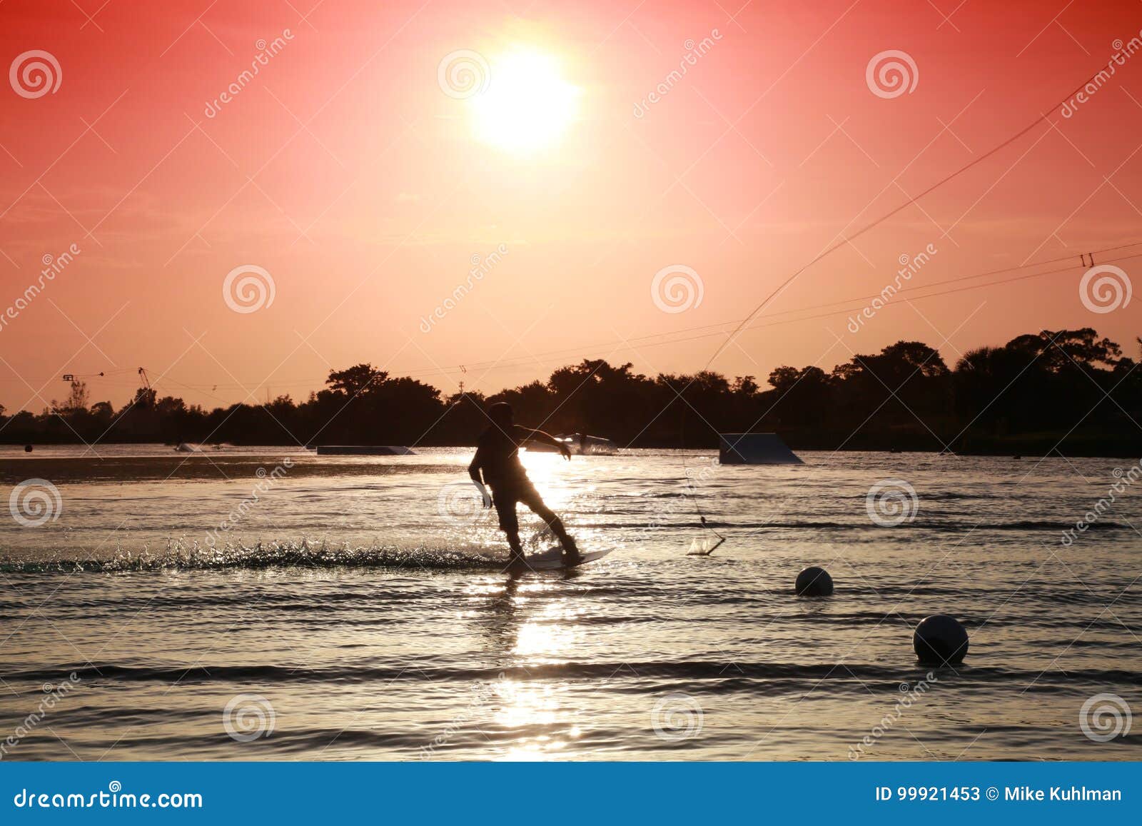 Wake Boarder Near Sunset stock image. Image of active - 99921453