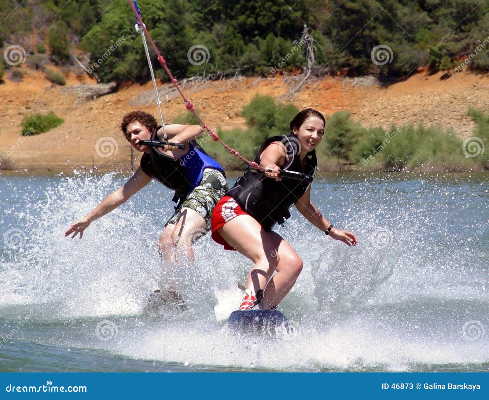 Wake boarders stock image. Image of couple, women, lake - 46873