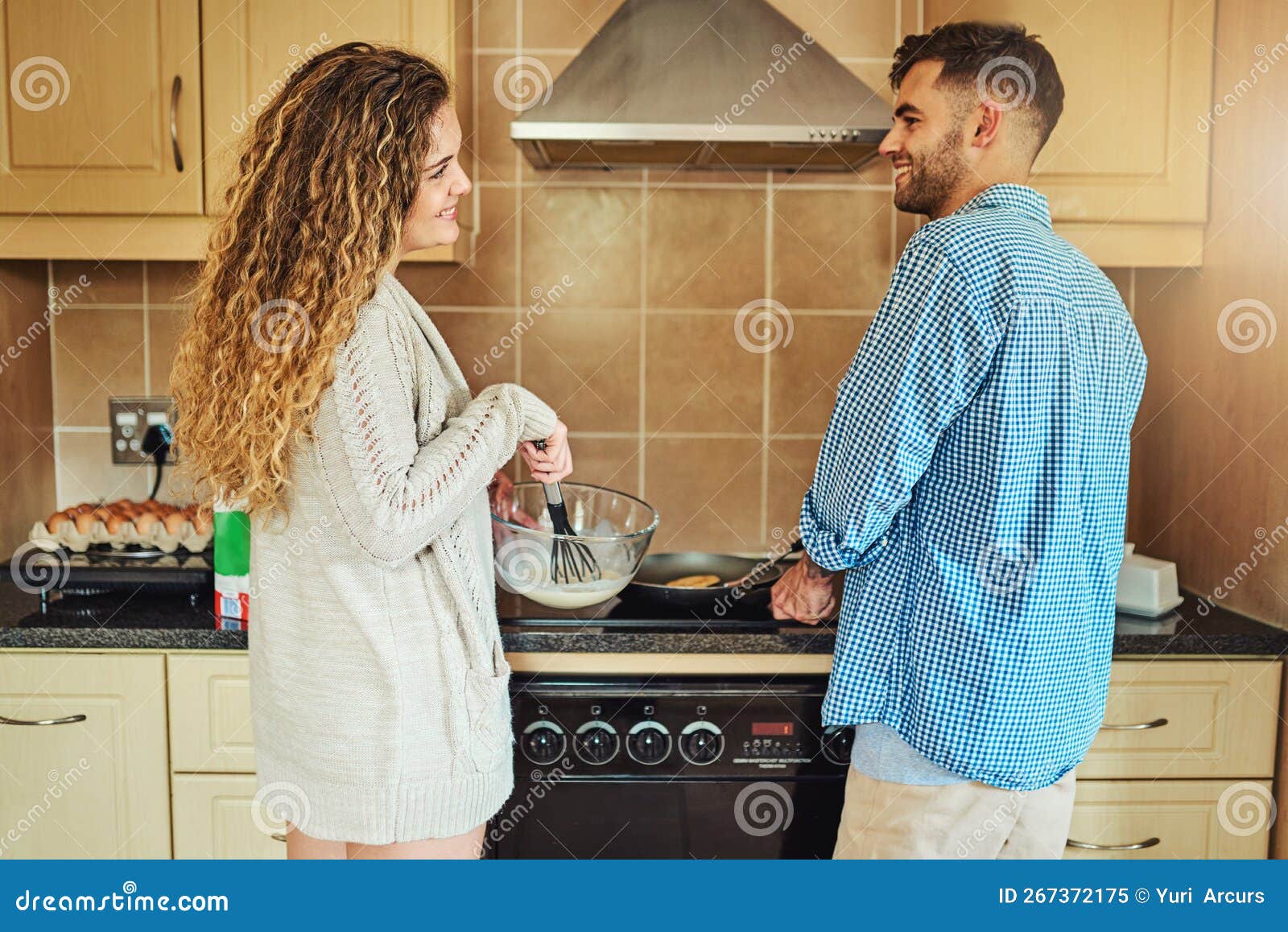 We Wake Together and Bake Together. a Young Couple Working in the ...