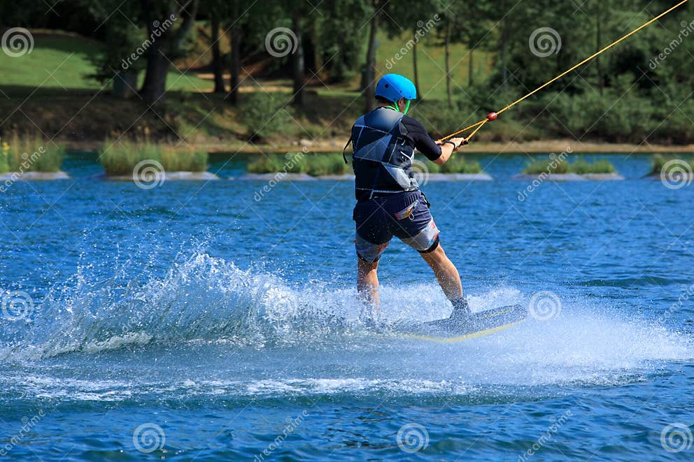 Wakeboard Training with Water Splash and Professional Wakeboarder at a ...