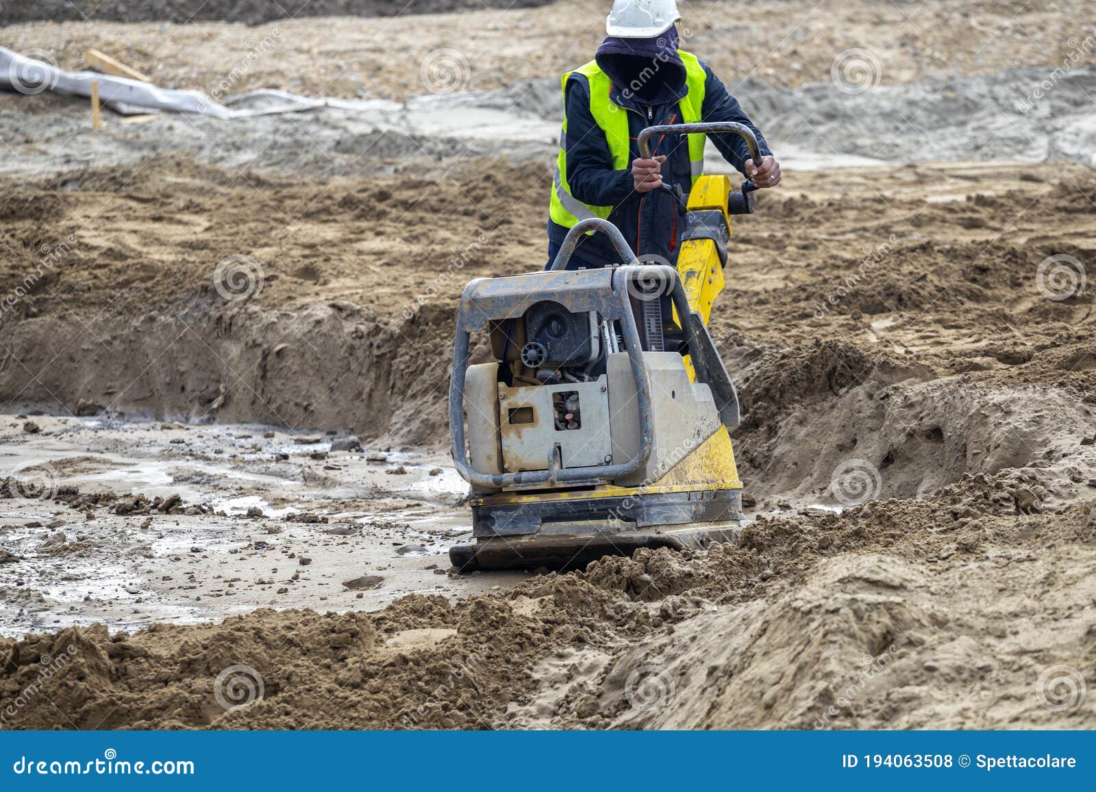 Walk Behind Vibrating Machine is Compacting Soil Stock Photo - Image of ...