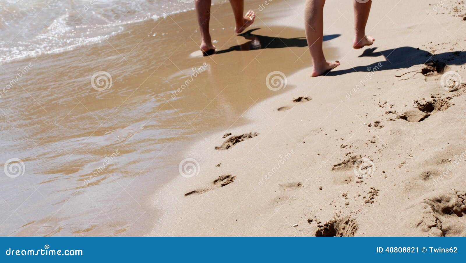 Walk on the sand beach stock image. Image of people, pair - 40808821
