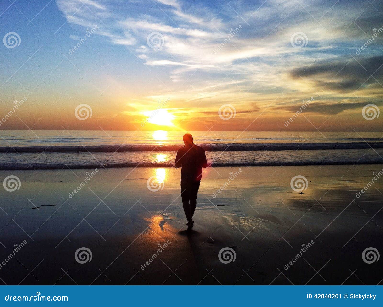 Walk into the sunset stock image. Image of east, beach - 42840201
