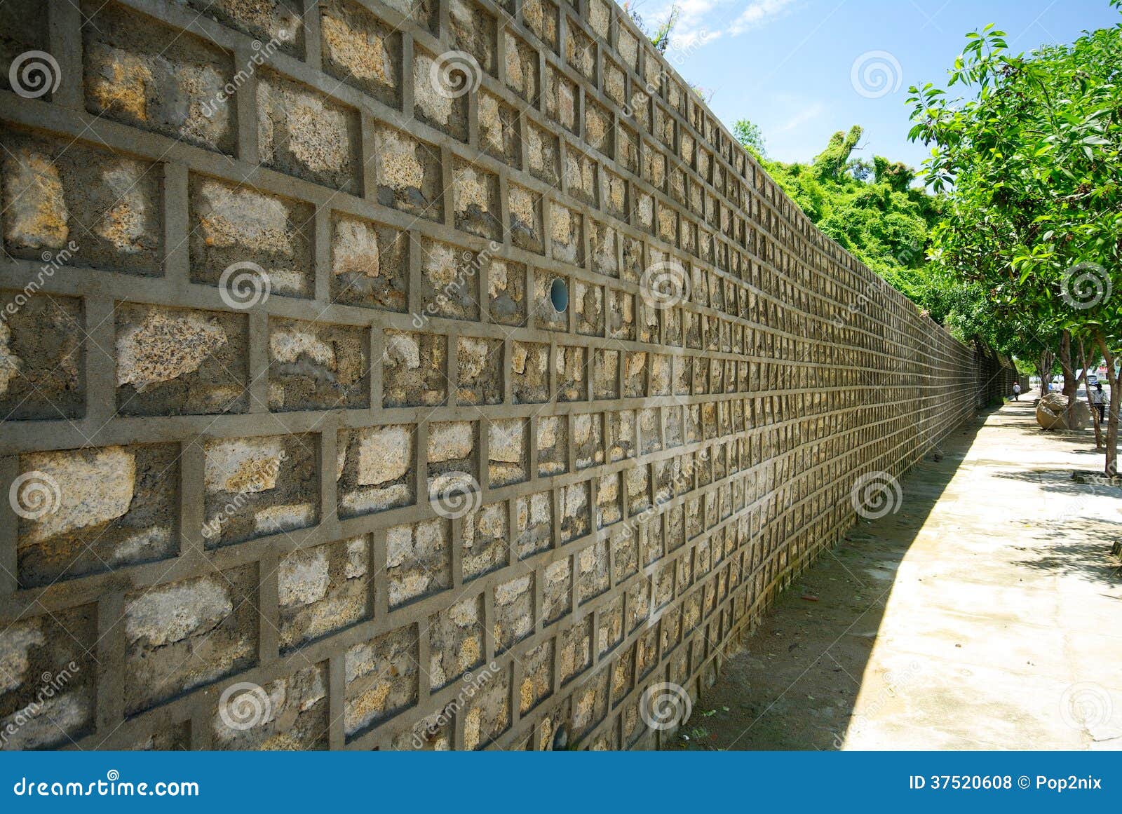 Walk way beside wall stock photo. Image of construction - 37520608