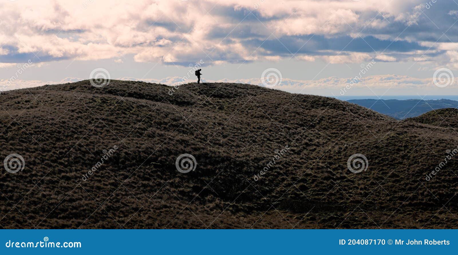 Walker Checking the Route stock photo. Image of landforms - 204087170