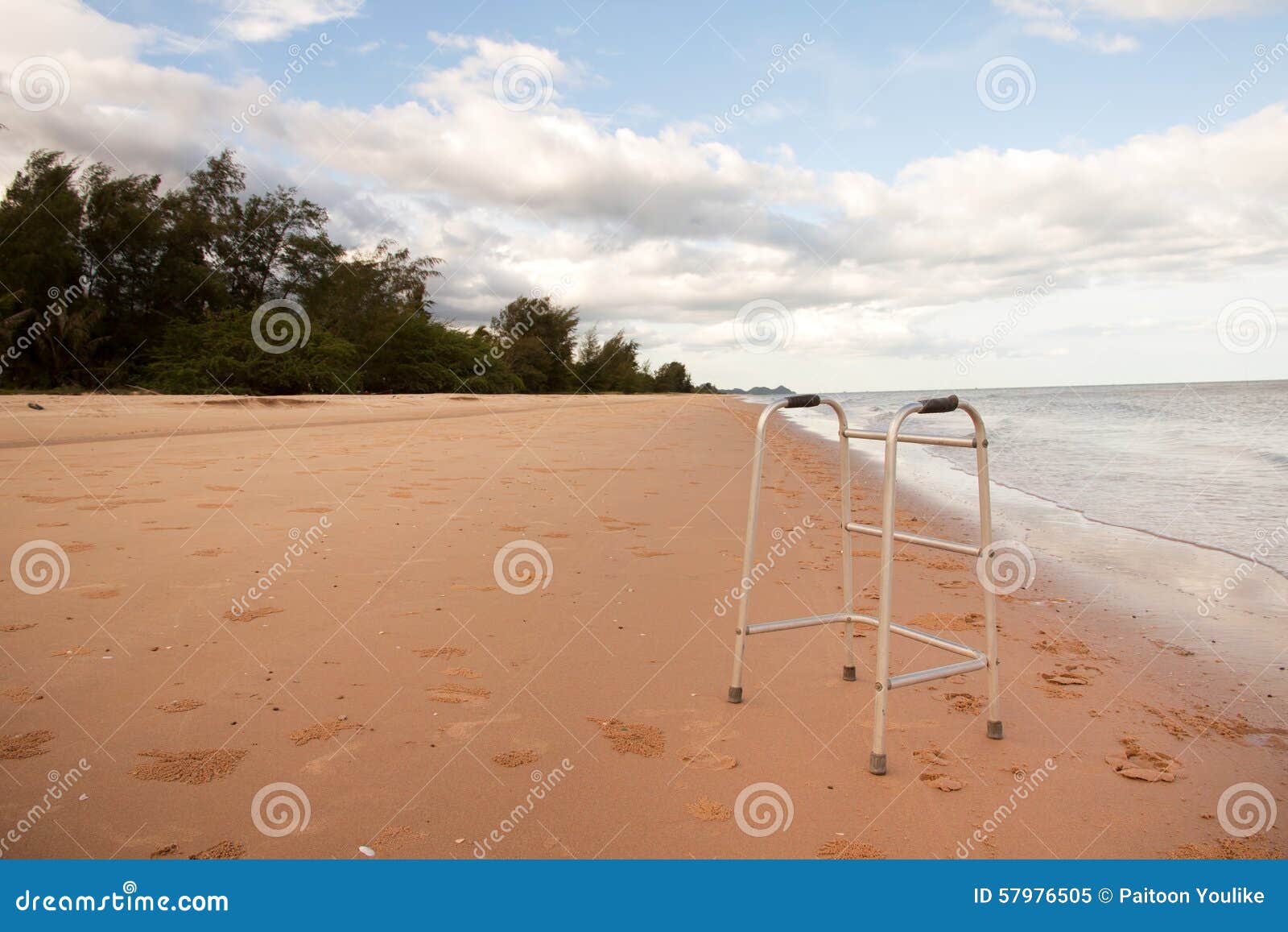 Walker on sand beach stock image. Image of home, aging - 57976505
