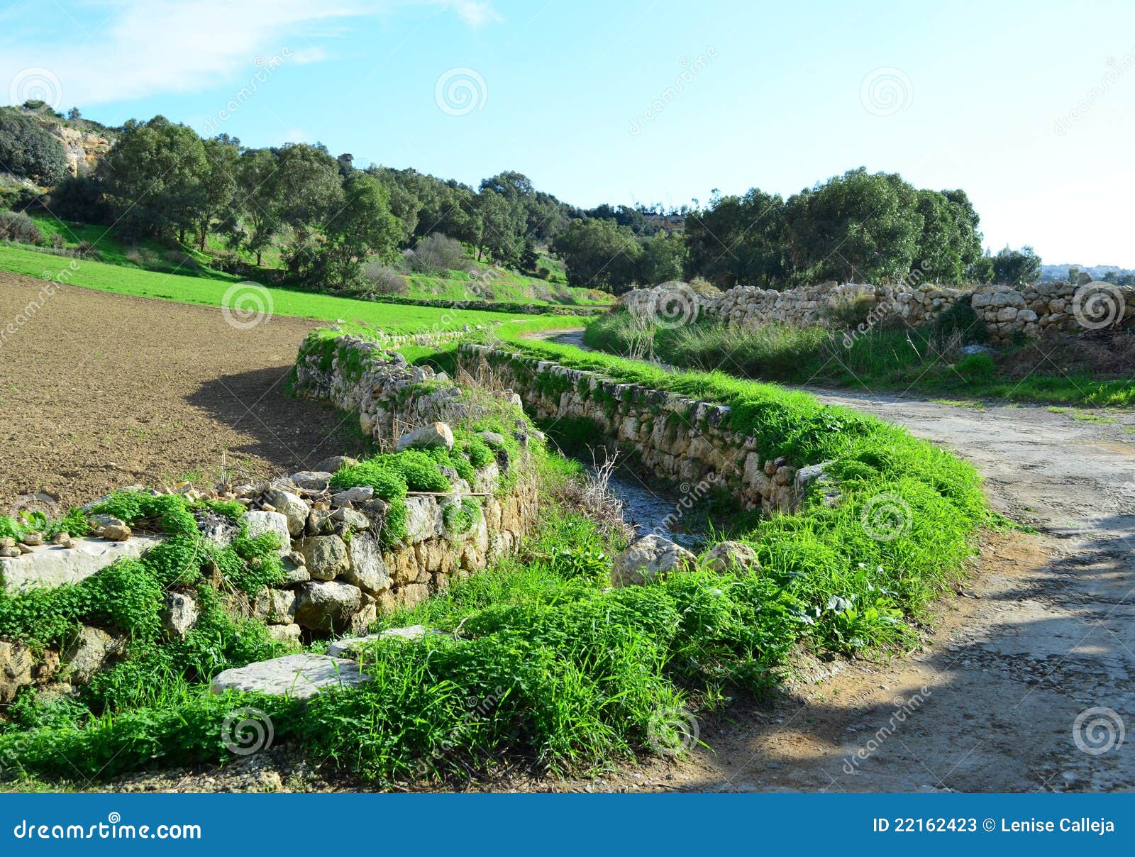 Walking Along the Stream - Malta Stock Image - Image of leisure, malta ...