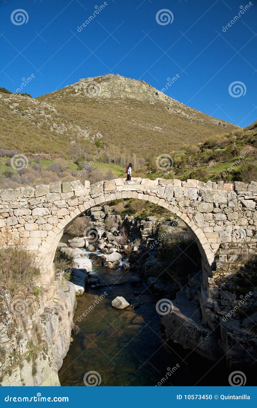 Walking on ancient bridge stock photo. Image of nature - 10573450
