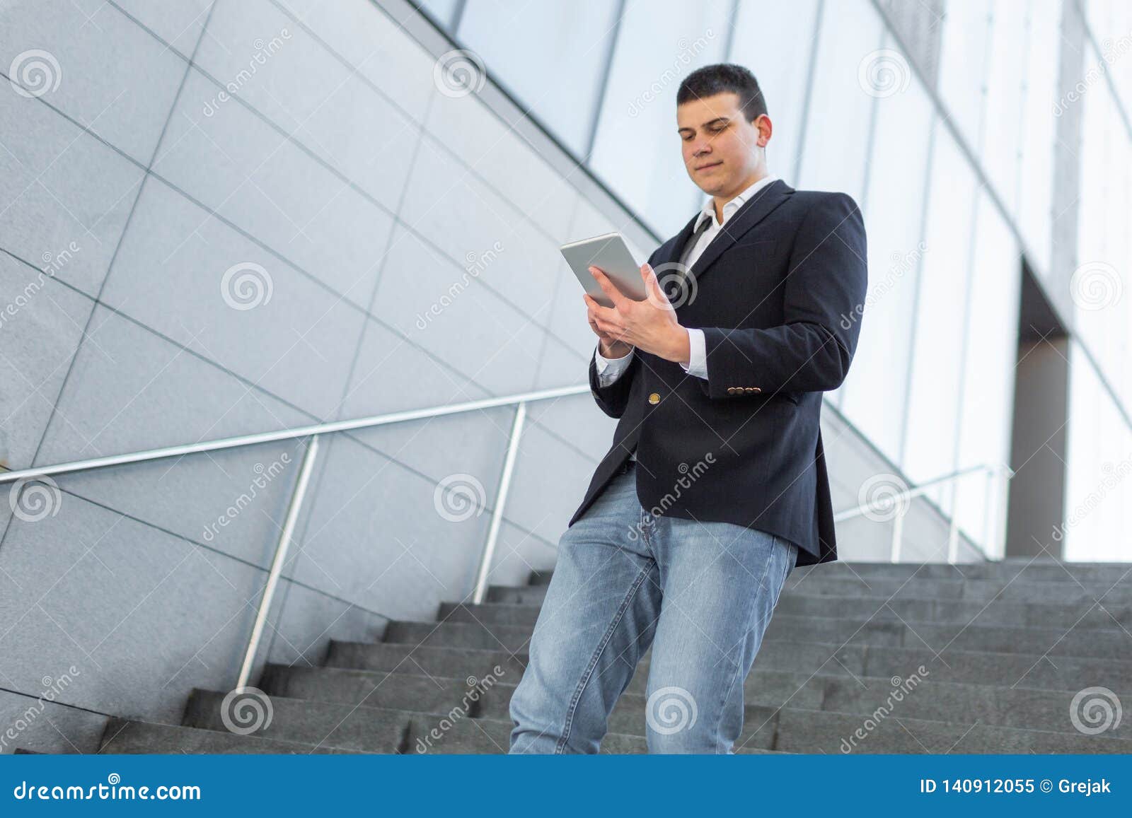 Walking Businessman Using Tablet Outside Stock Image - Image of mobile ...