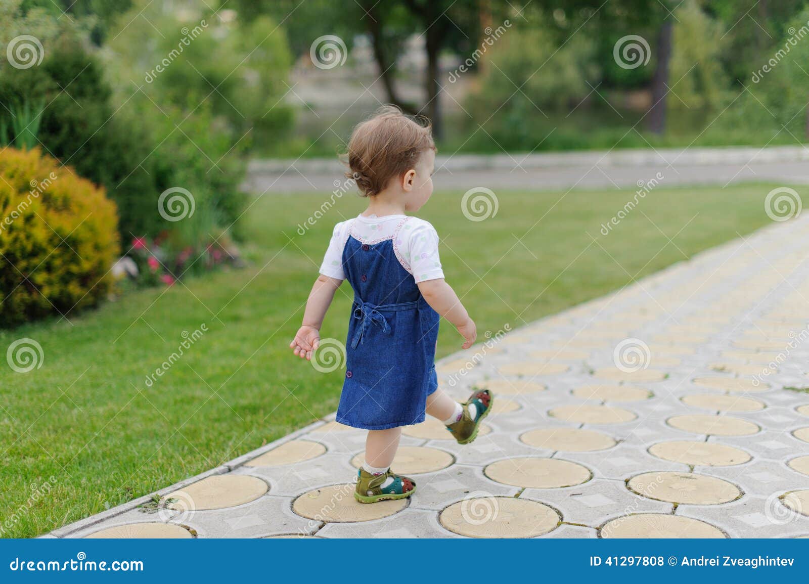 Walking Child on Path stock photo. Image of color, jeans - 41297808