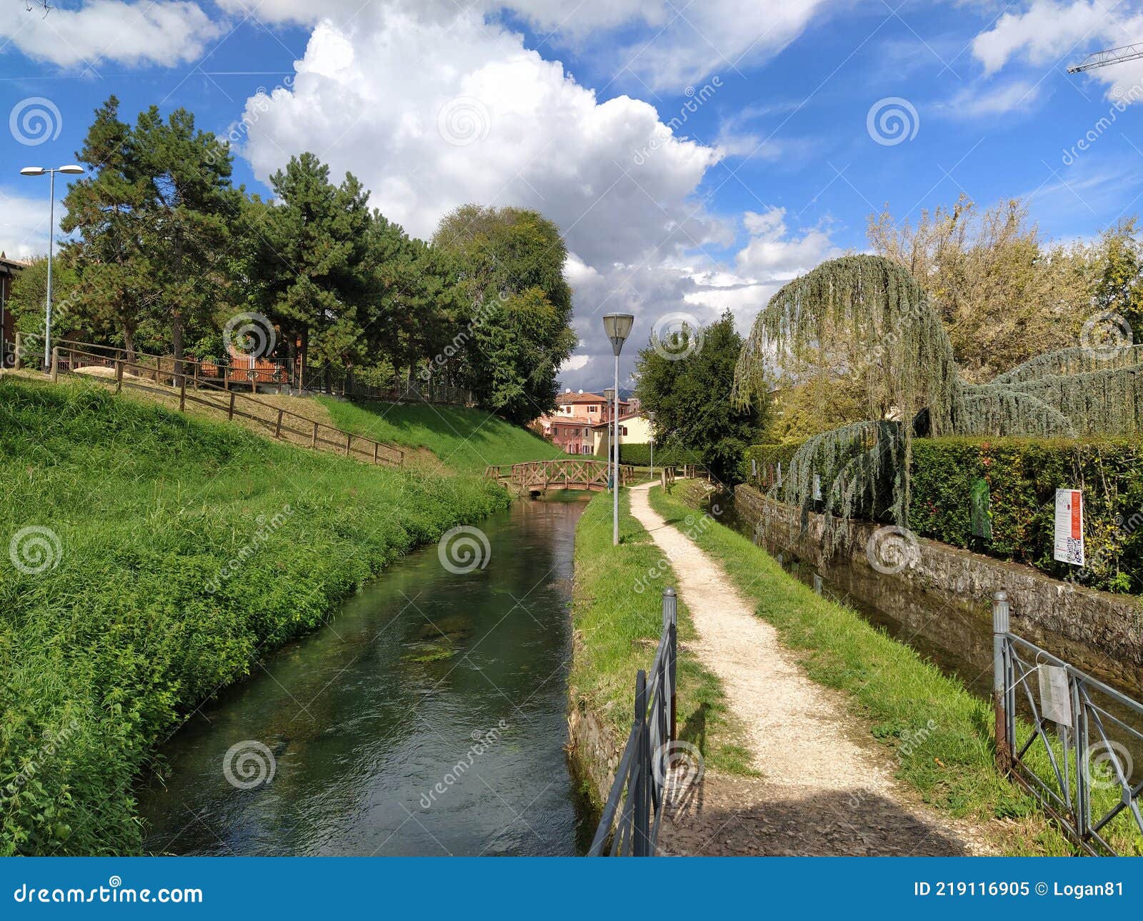 Close Up A Stream Of Clean Water Flows Into The Sink Sewer Hole. A Jet ...